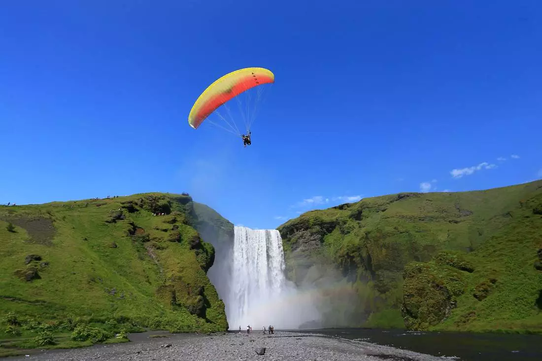 Paragliding over the waterfall.